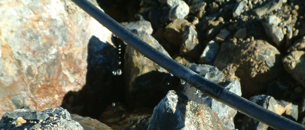 Drip line on a copper heap leach pad - Heap Solutions